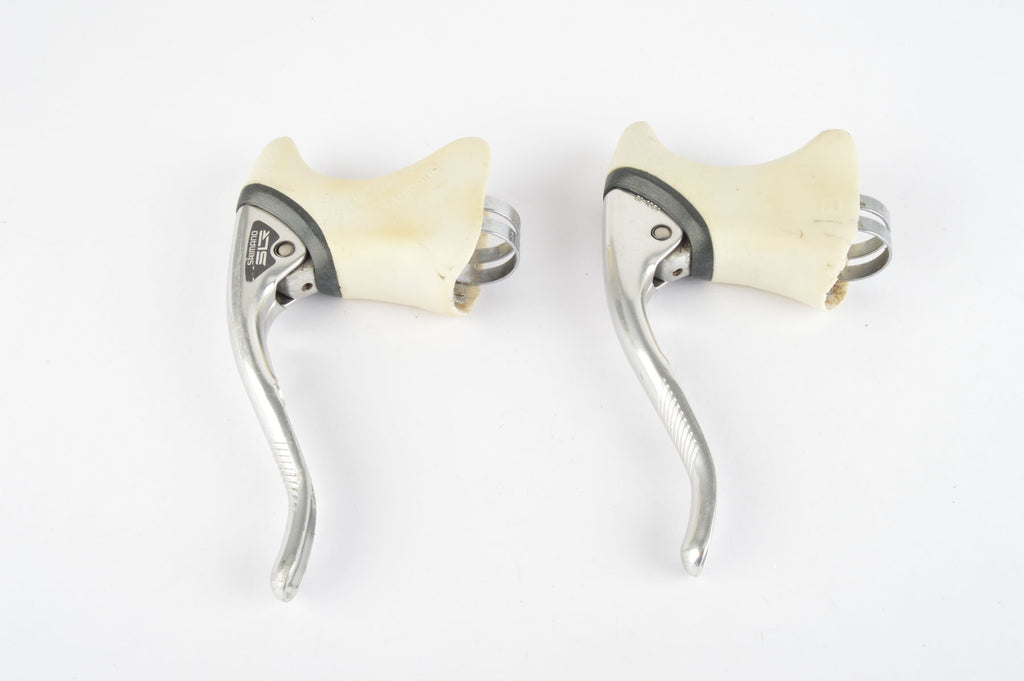 Shimano 105 #BL-1051 aero brake lever set with white hoods from the la ...